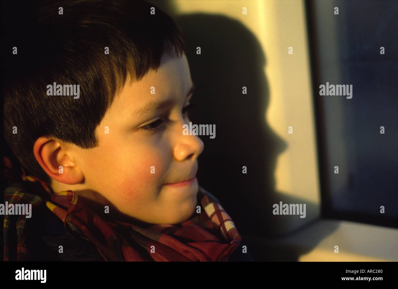 Boy looking forward profile hi-res stock photography and images - Alamy