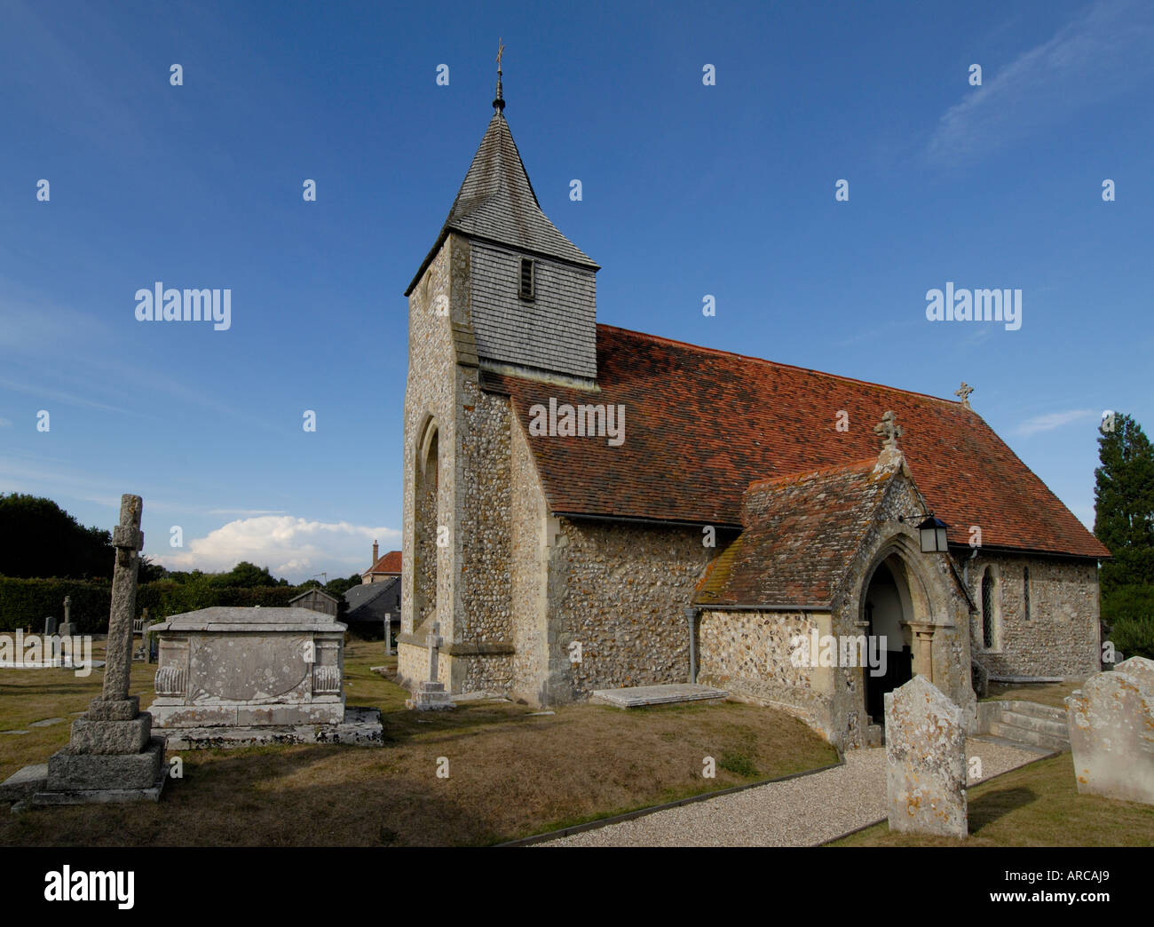 Ashlar and rubble built St Nicholas church West Itchenor Stock Photo ...