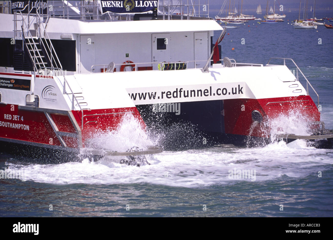 Red Funnel Catamaran Red Jet 4 leaving Cowes Harbour Isle of Wight UK ...