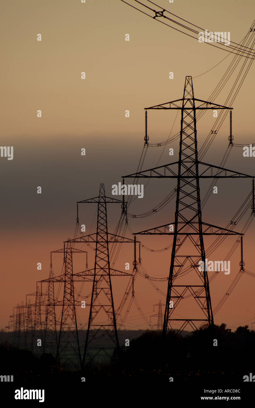 National grid pylons and overhead electricity power lines running ...