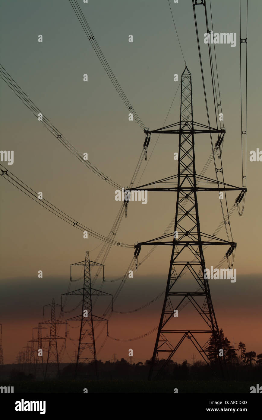 National grid pylons and overhead electricity power lines running ...