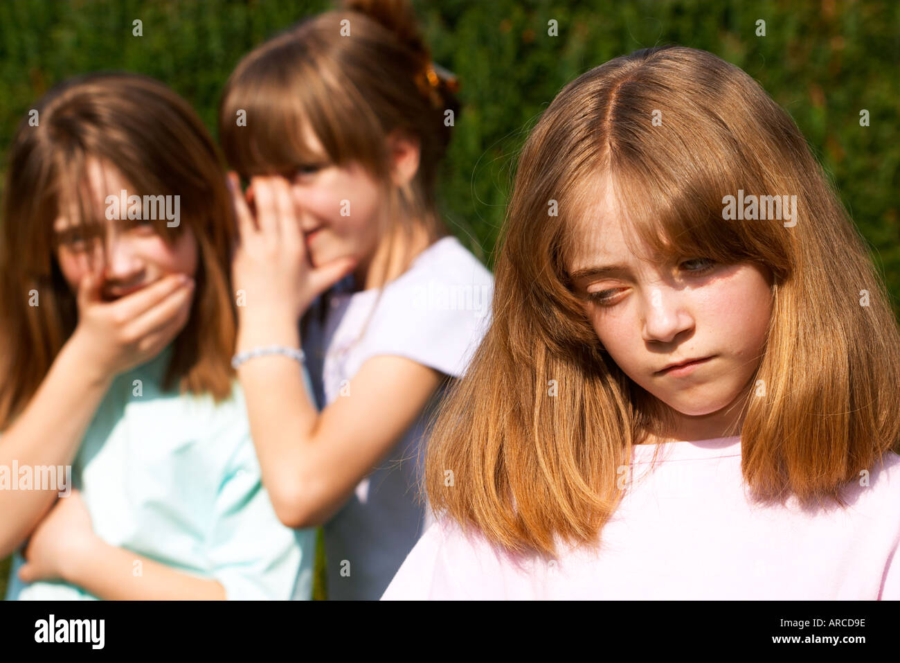 Bullies whisper behind victim s back Young bully girls being cruel ...