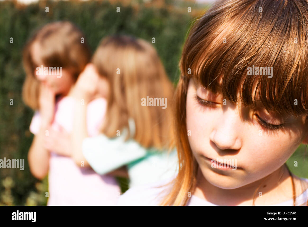 Bullies whisper behind victim s back Young bully girls being cruel ...