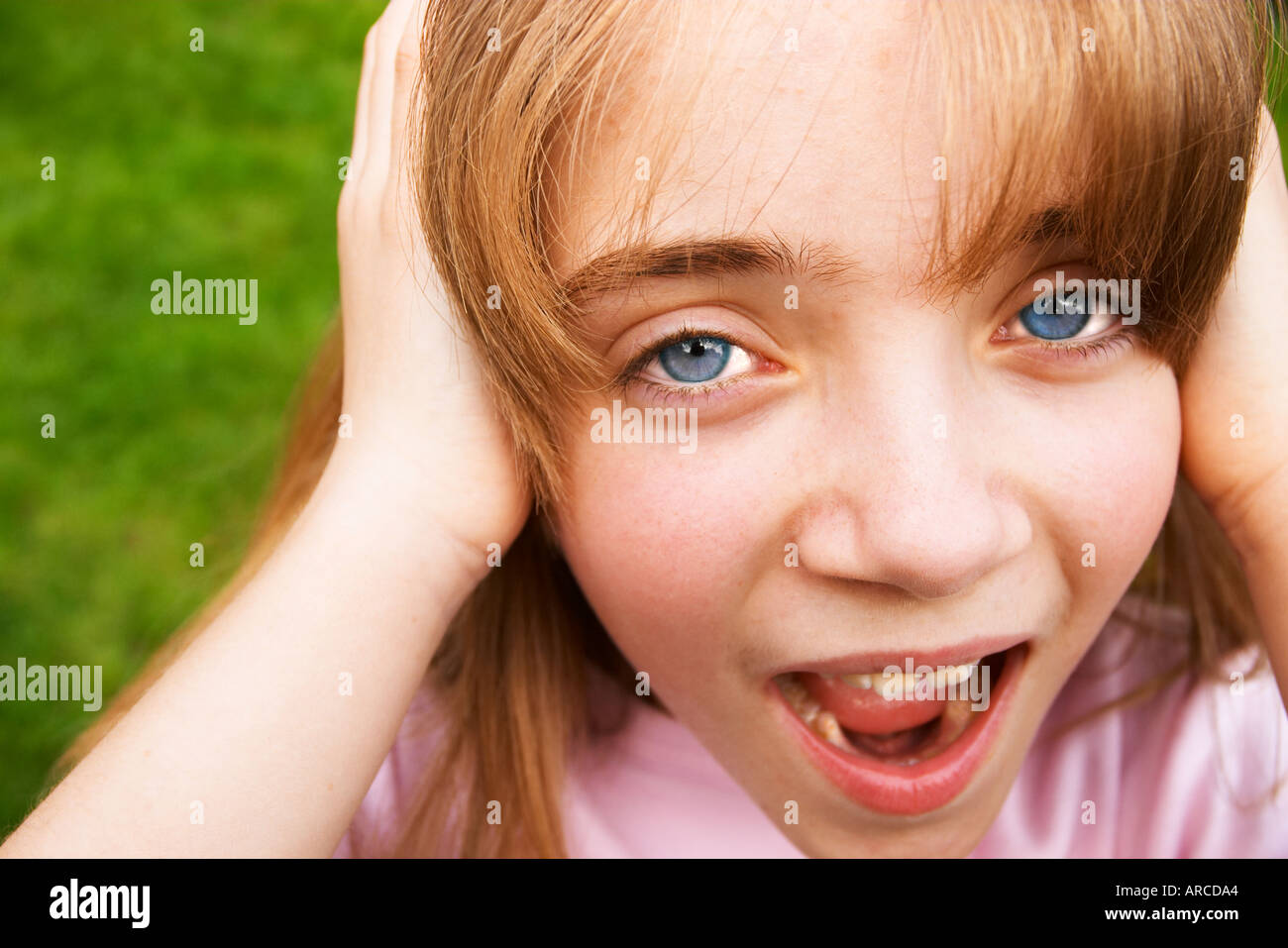Too loud music fingers ears hearing loud hi-res stock photography and ...