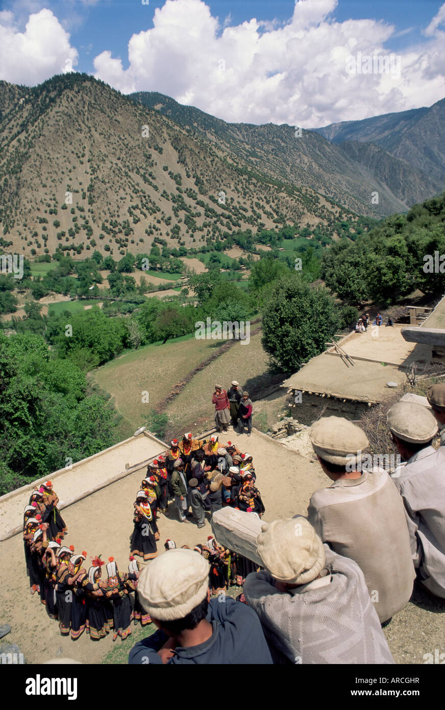 Men watching Kalash women dancing, Spring Festival, Joshi, Bumburet ...