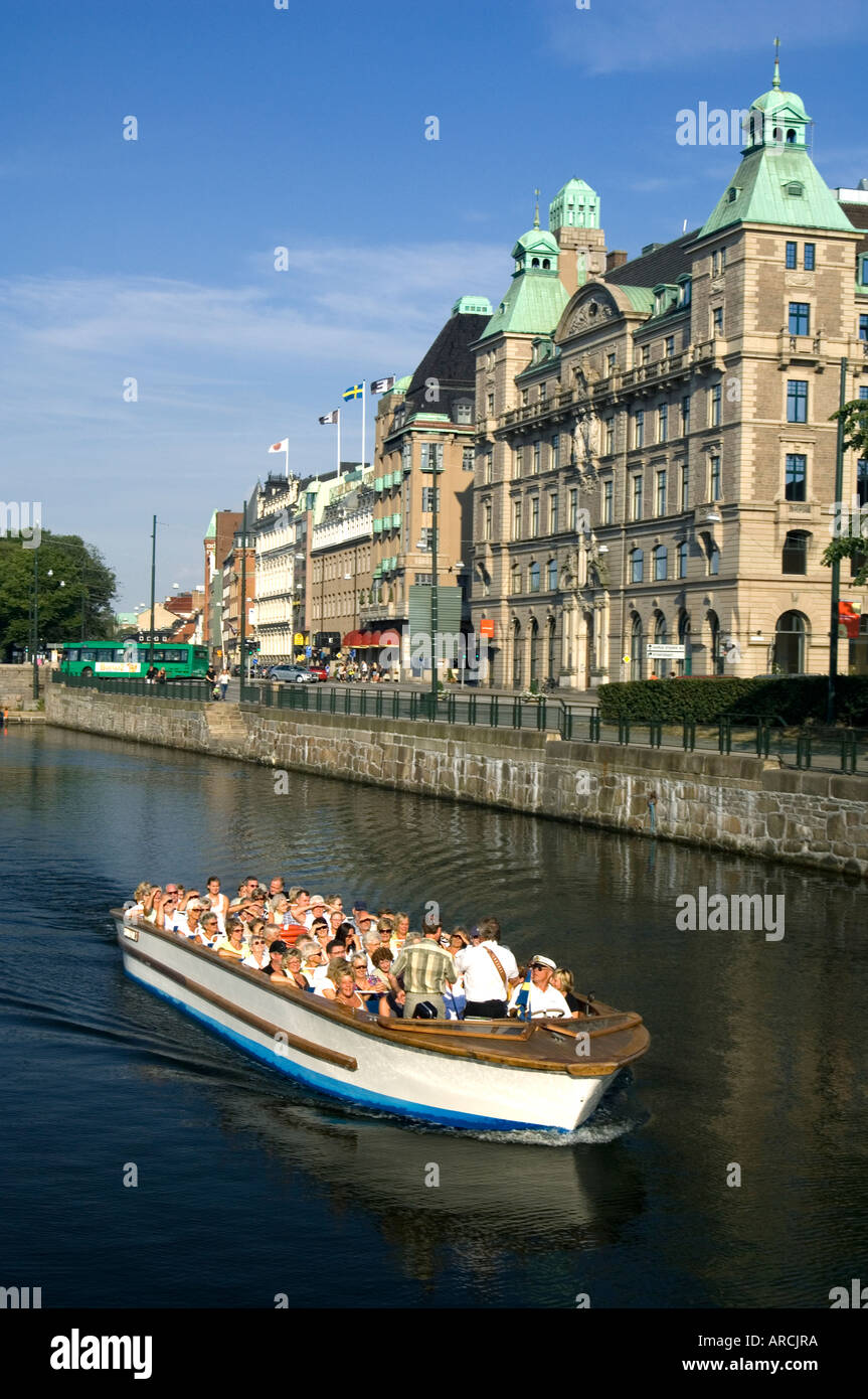 Tourists enjoying a canalboat trip near the Malar Bron Bridge on the ...