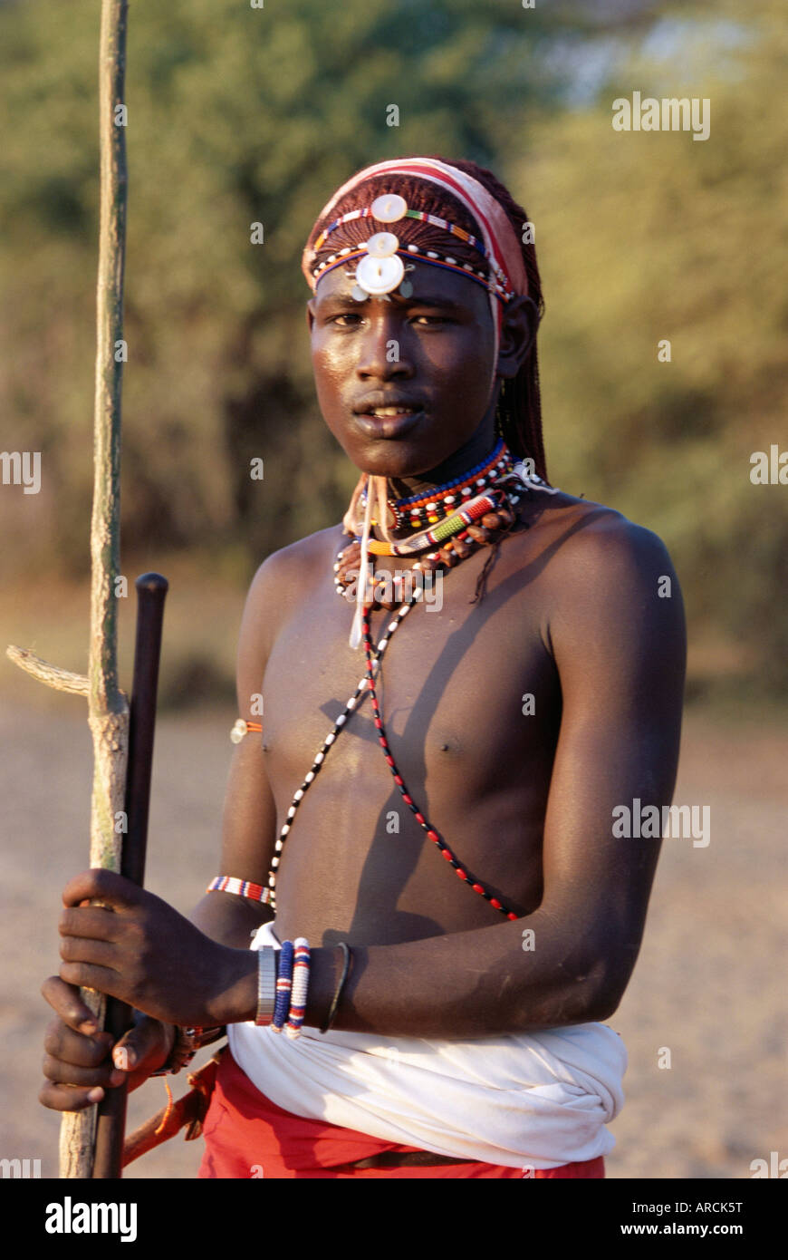 Young Masai morani or warrior with henna-ed hair and beadwork, Laikipia ...