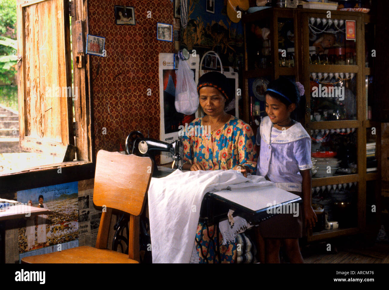 Minangkabau Mother Girl Sewing clothes Pandai Sikek Long House ...