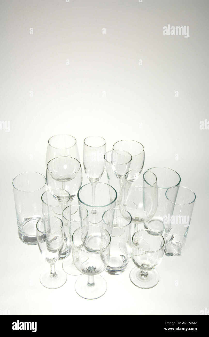 A group of empty clean glasses of all shapes and sizes Stock Photo - Alamy