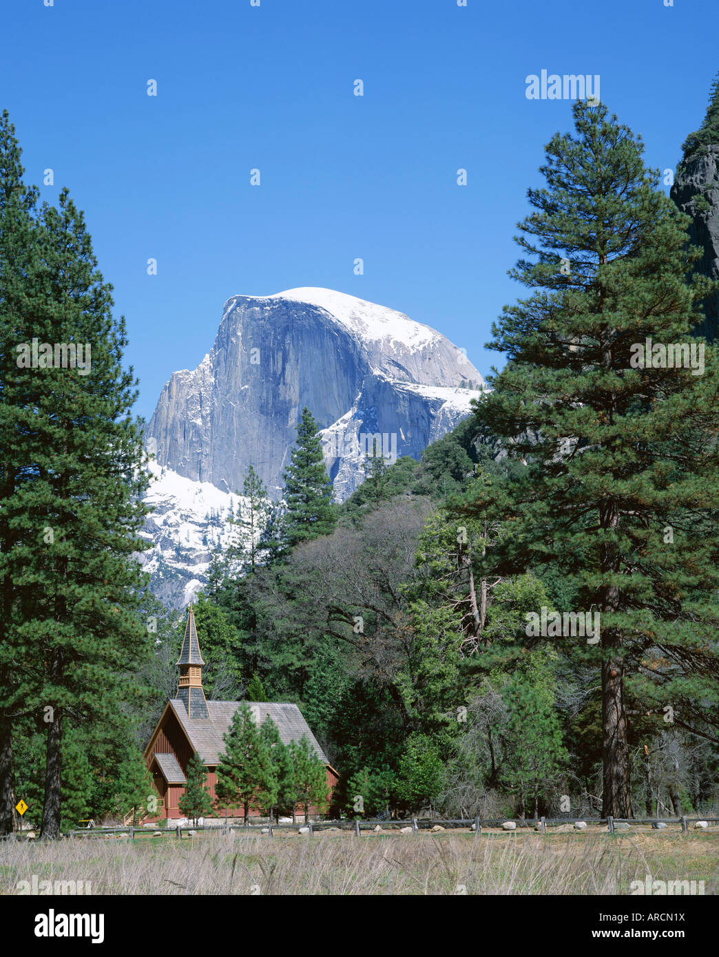 Half Dome mountain peak and chapel, built in 1879, the oldest building ...