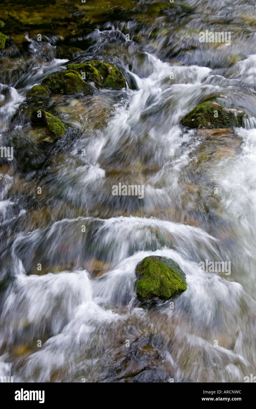 Water flowing smoothly over rocks hi-res stock photography and images ...