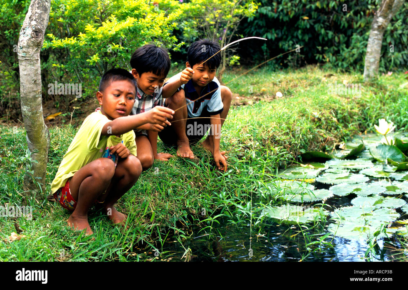 Fishing angling Boys Java Javanes Indonesia Stock Photo - Alamy