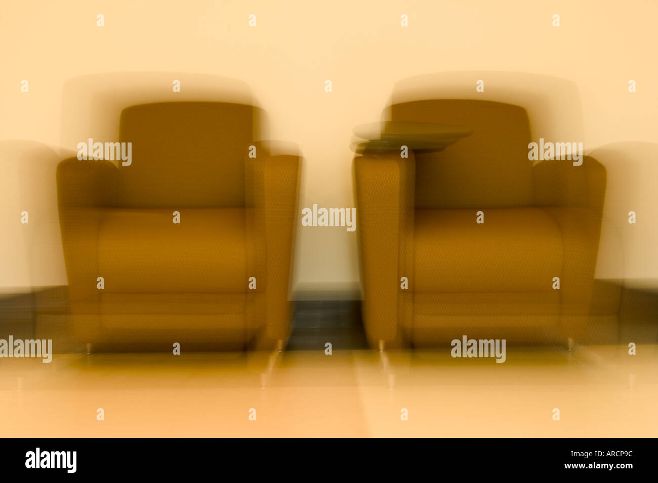 Two chairs in the lobby of an office building Stock Photo - Alamy