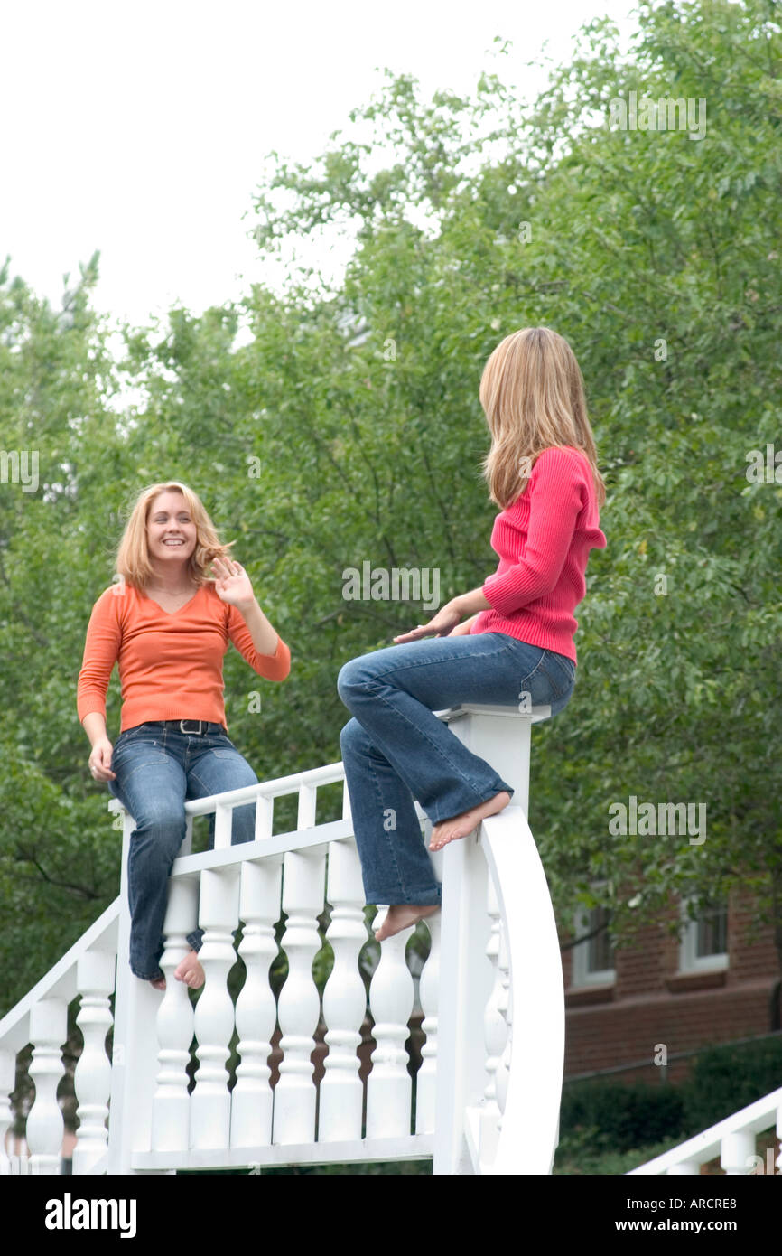 Two people fence talking hi-res stock photography and images - Alamy