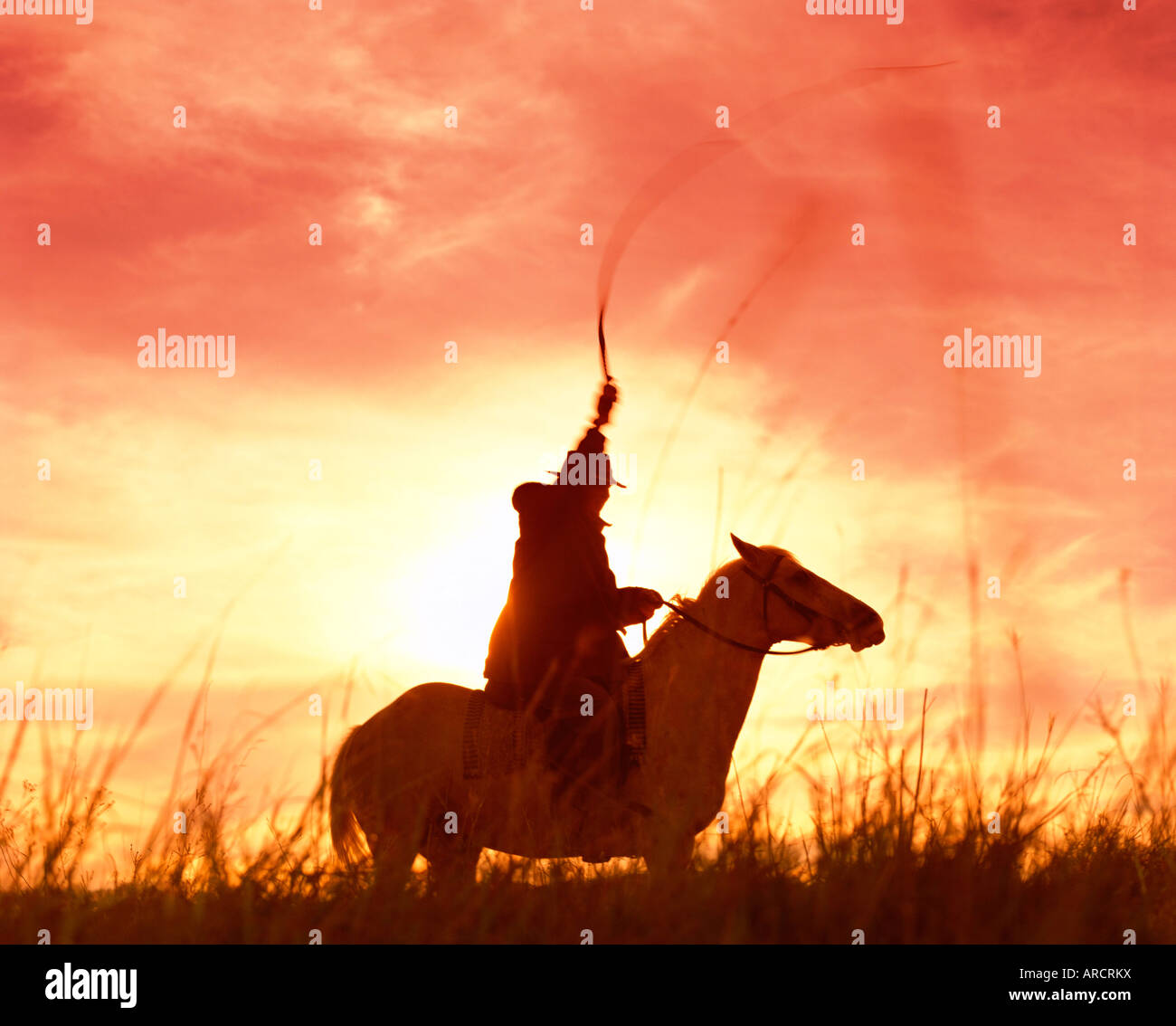 Silhouette man horse against sunset hi-res stock photography and images ...