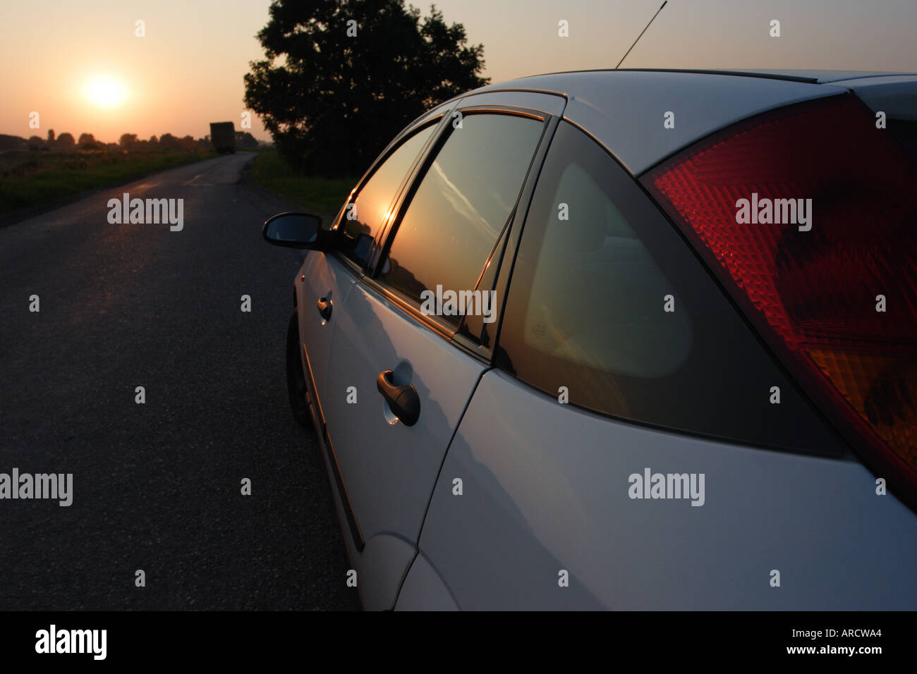 White car moving to the left hi-res stock photography and images - Alamy