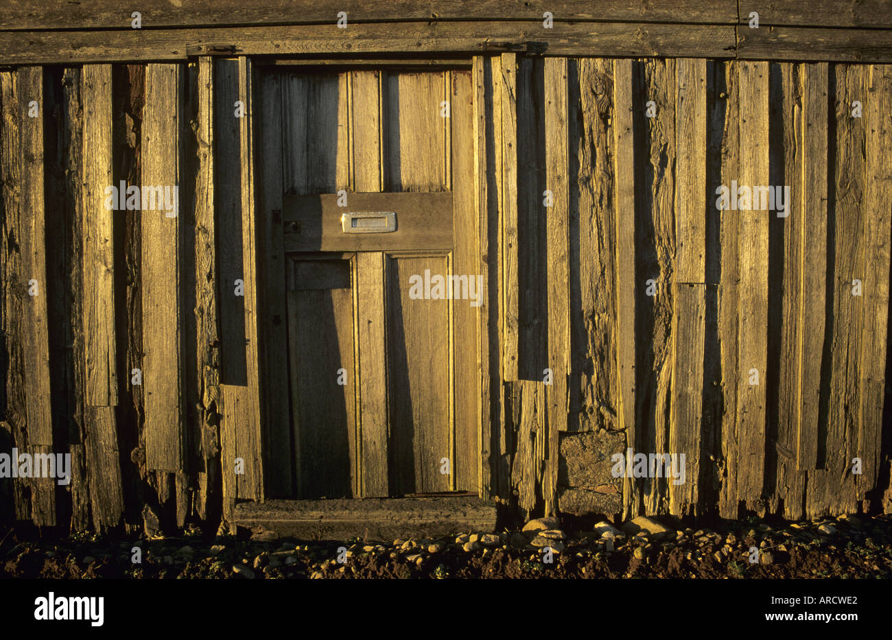 Wooden door in old timber building Stock Photo - Alamy