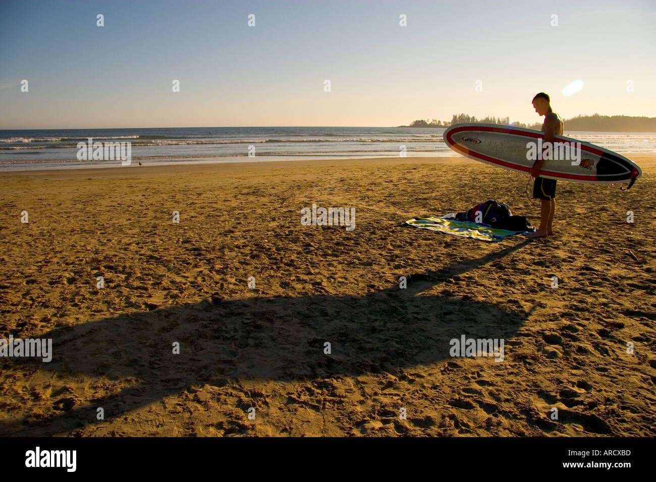 West Coast Surfer and Shadow Stock Photo - Alamy