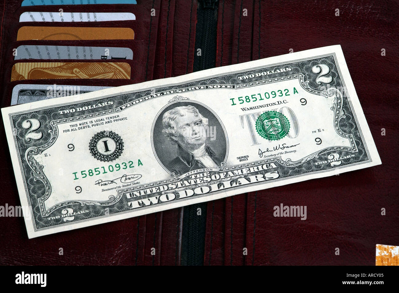Rare two dollar USA bill or banknote on wallet with credit cards Stock ...