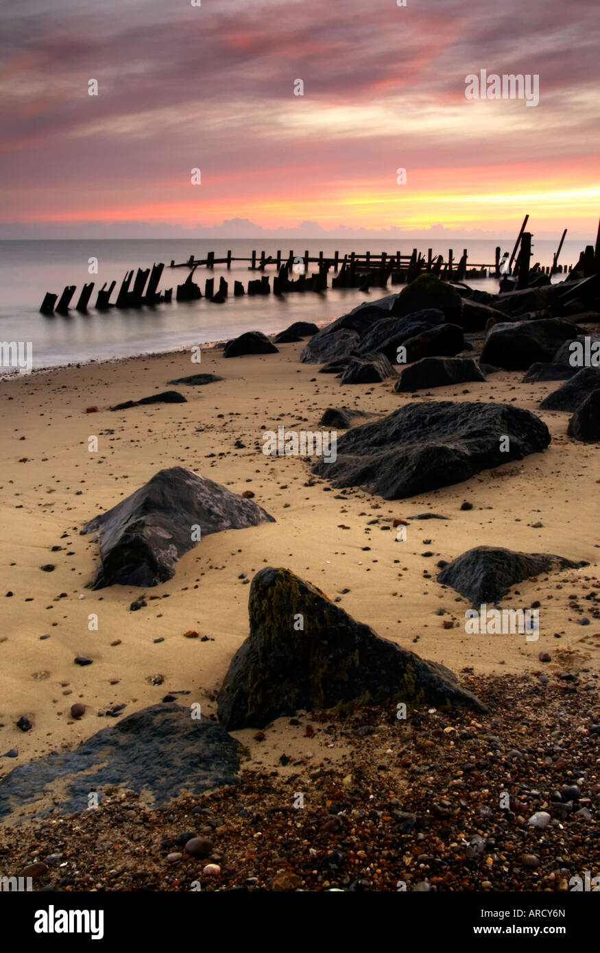 Happisburgh Beach at sunrise on the Norfolk Coast Stock Photo - Alamy