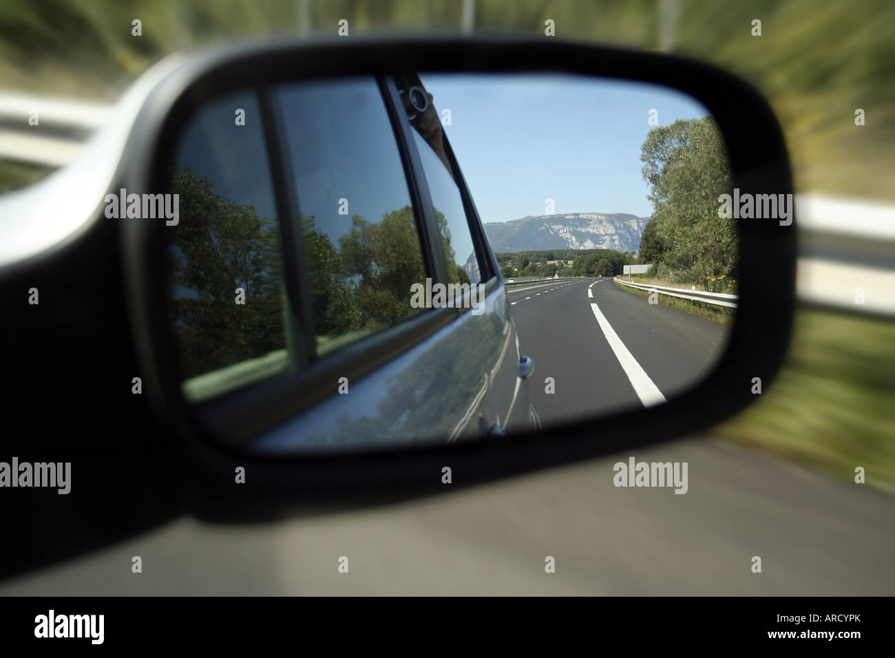 Rear road view - on an empty highway Stock Photo - Alamy