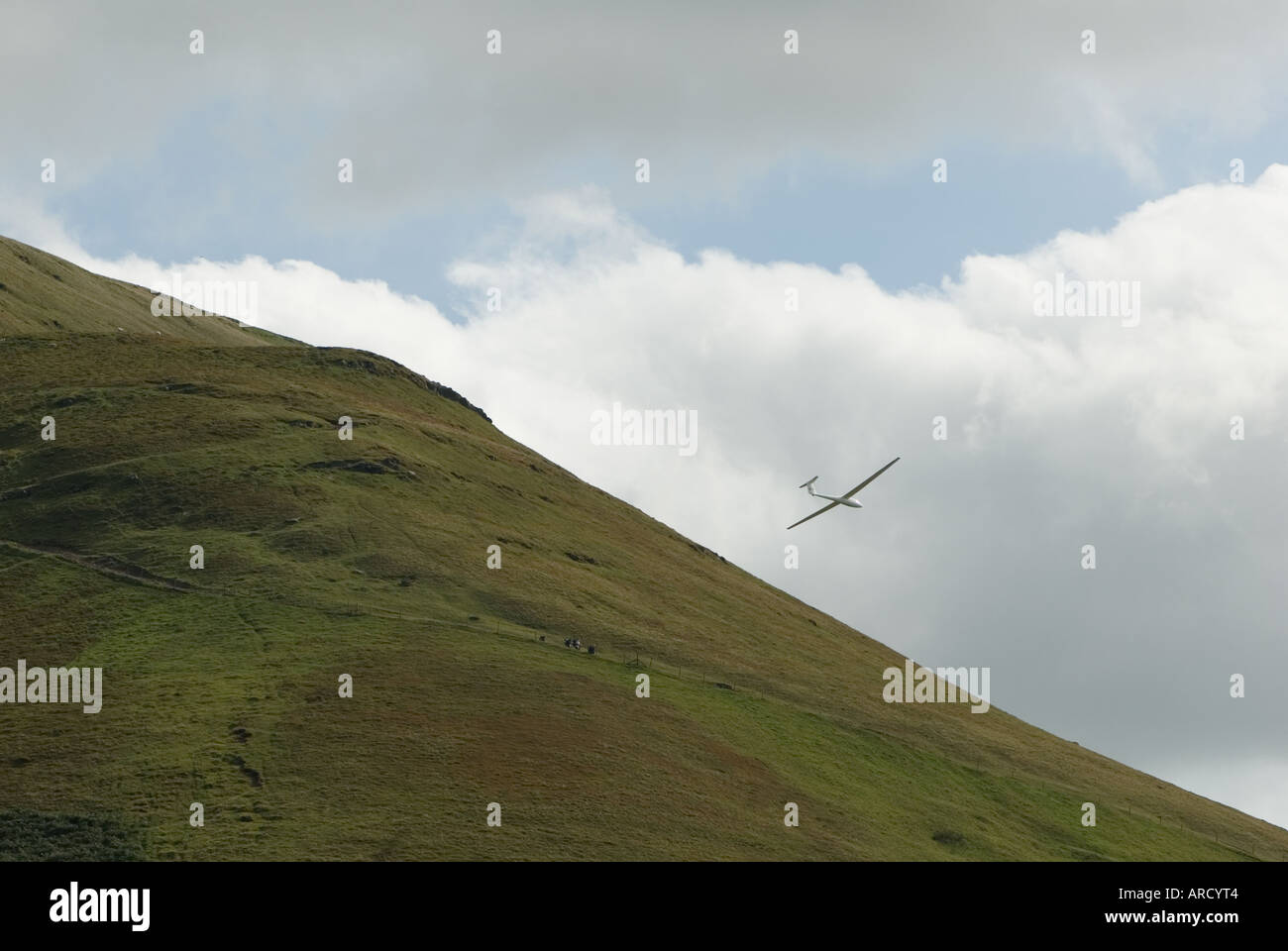 Glider and Walkers above Talgarth Black Mountains Brecon Beacons Mid ...