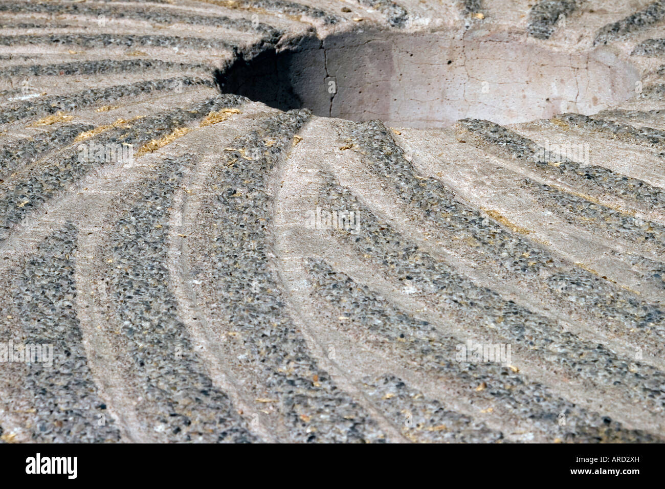 Detail of a mill stone Stock Photo - Alamy
