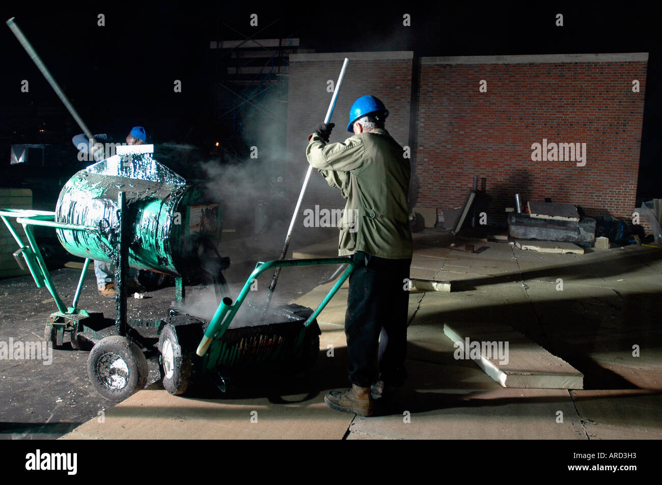 Pouring tar hi-res stock photography and images - Alamy