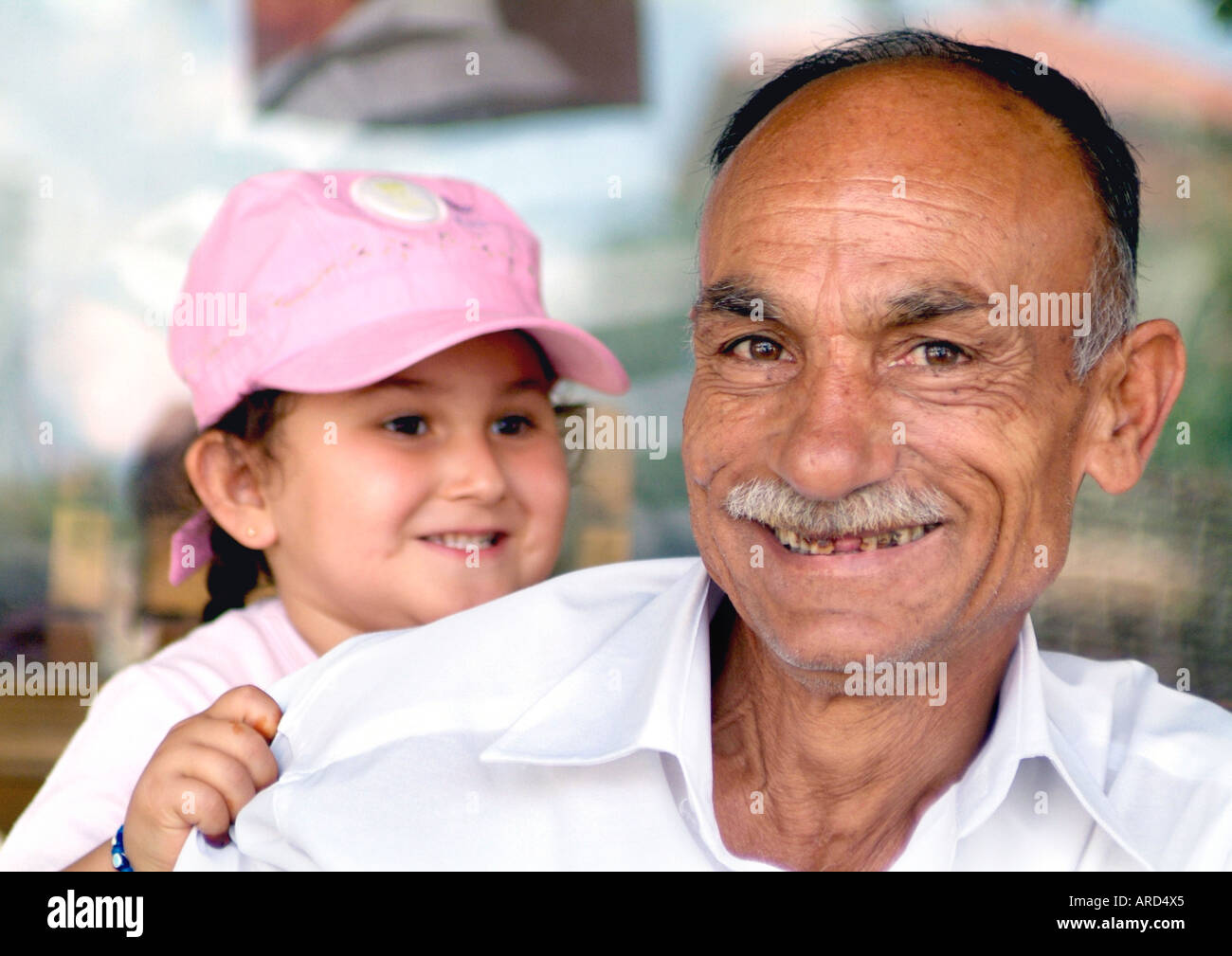 Old man with grand daughter Turkey Stock Photo - Alamy