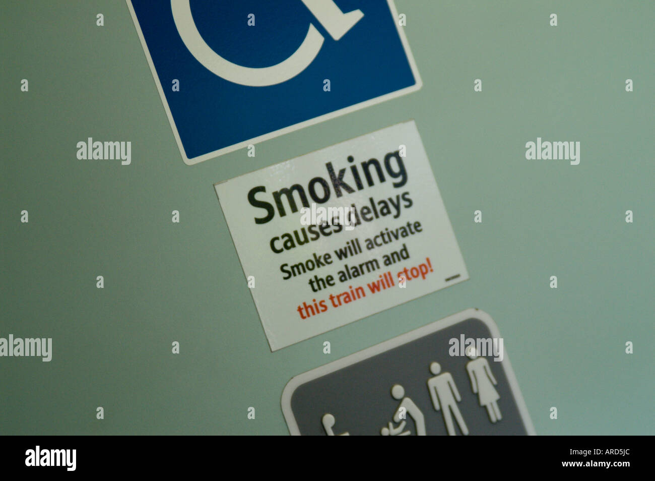 Smoking causes delays sign on train in UK 2006 before smoking ban Stock ...
