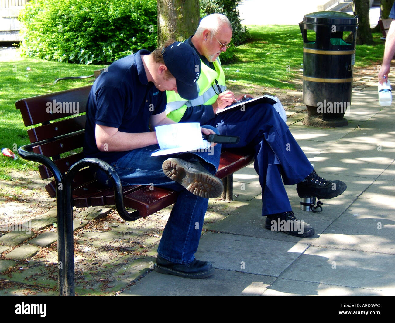 Council workers filling in job paperwork Bradford Stock Photo - Alamy