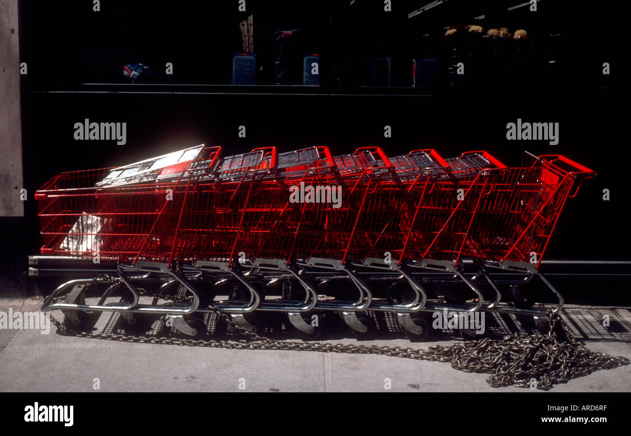Carts chained down in front of a supermarket Stock Photo - Alamy