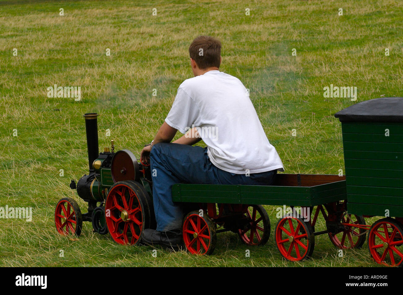 Riding a miniature traction engine at the Selkirk vintage car show in ...
