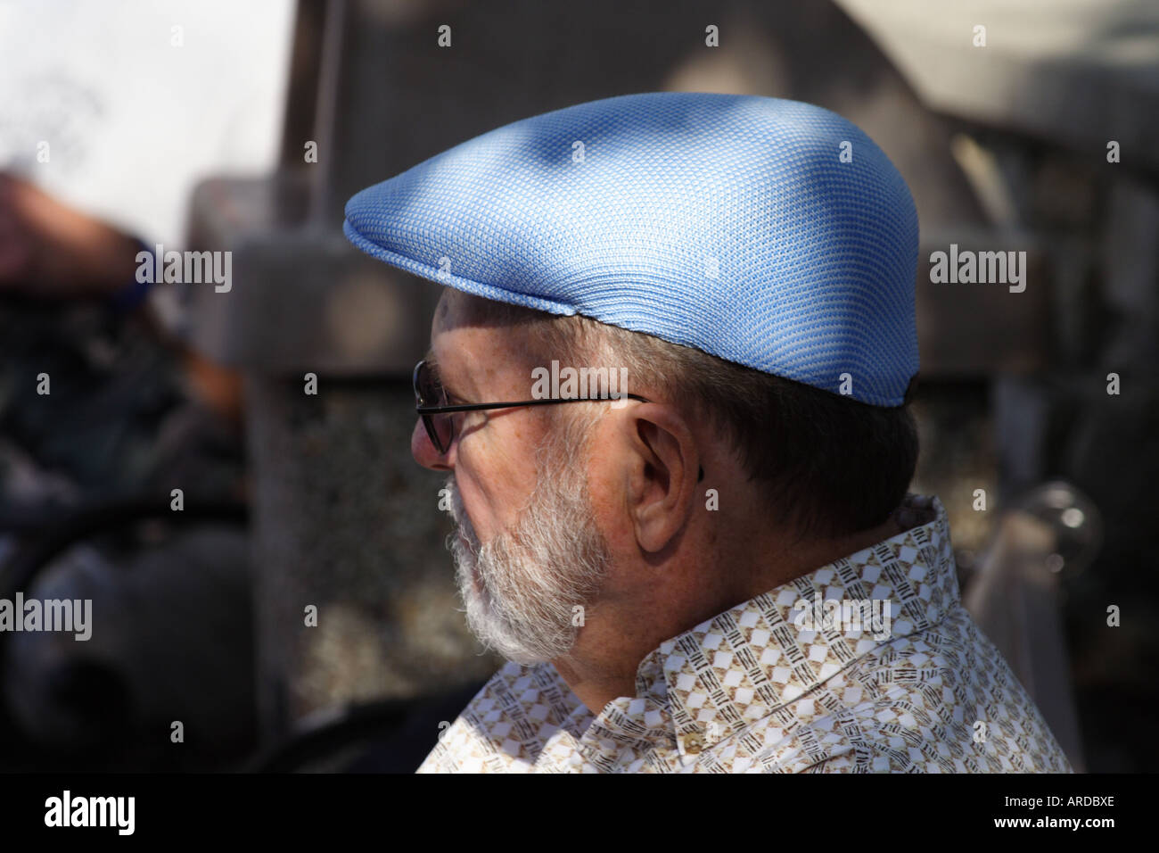 Blue hat. Old man with blue hat Stock Photo - Alamy