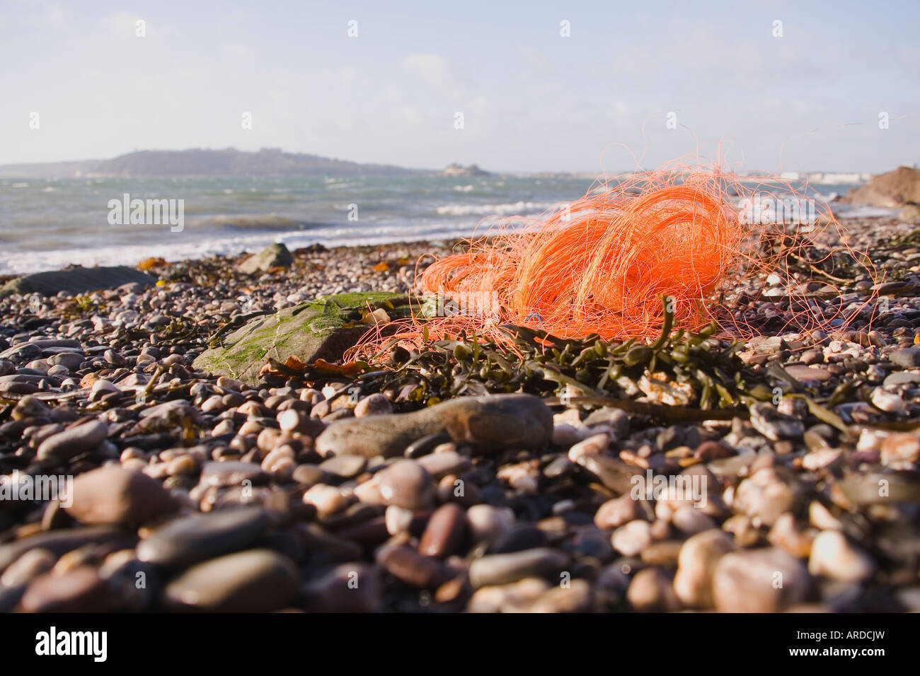 Rubbish on a beach Stock Photo - Alamy