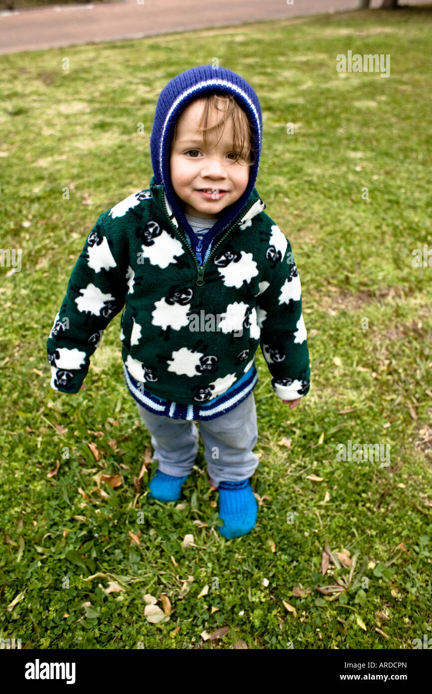 a small kid staring at the camera Stock Photo - Alamy