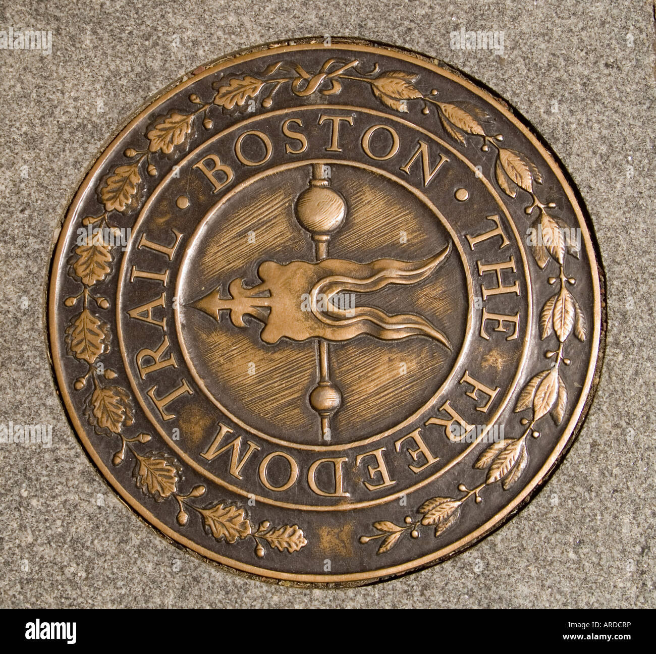 A bronze circular plaque marking the Freedom Trail in Boston ...