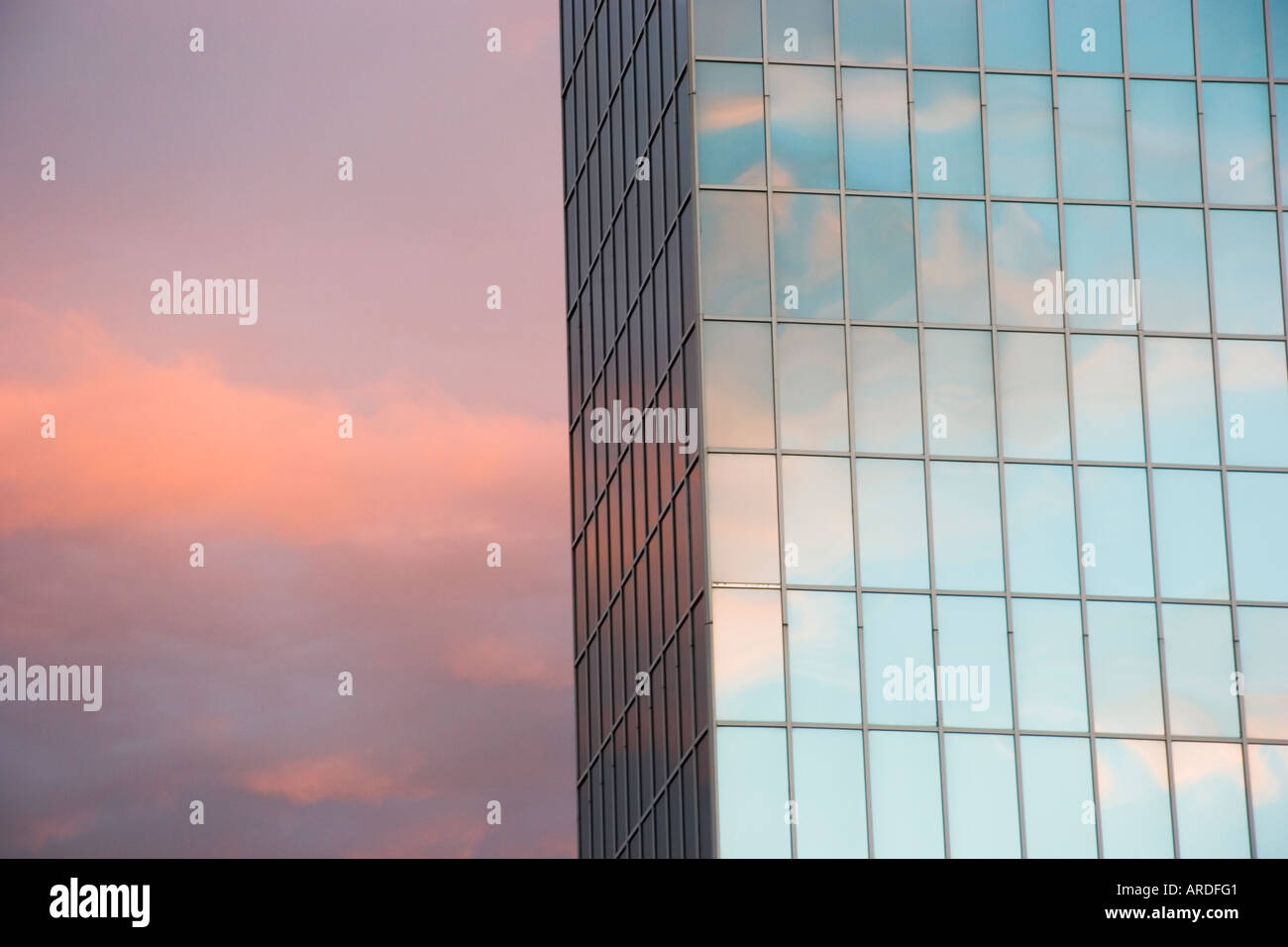 glass building against sunset sky Stock Photo - Alamy