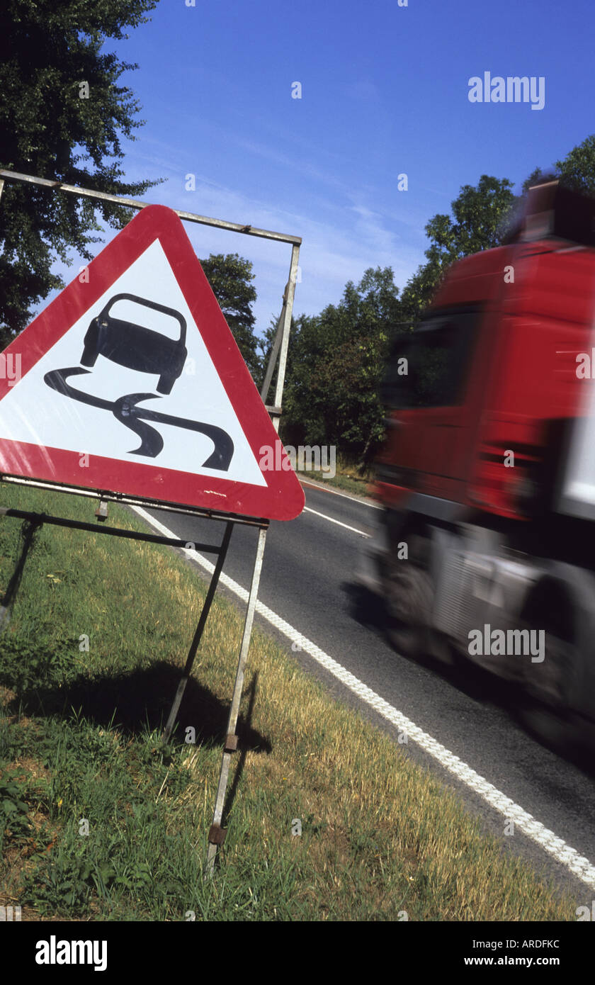 lorry passing slippery road surface warning sign leeds uk Stock Photo ...
