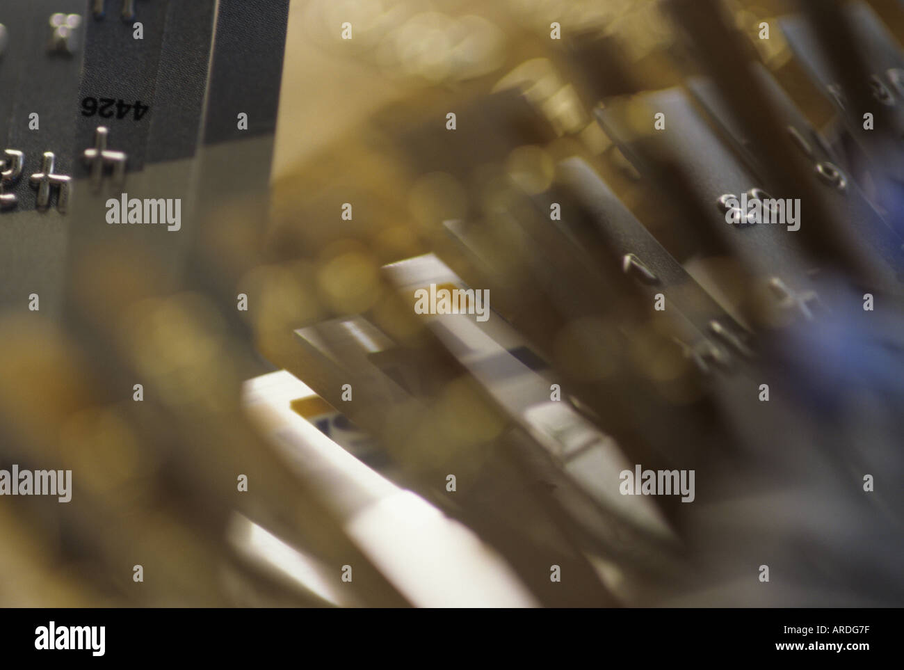 Partially shredded credit cards with numbers still showing identity ...