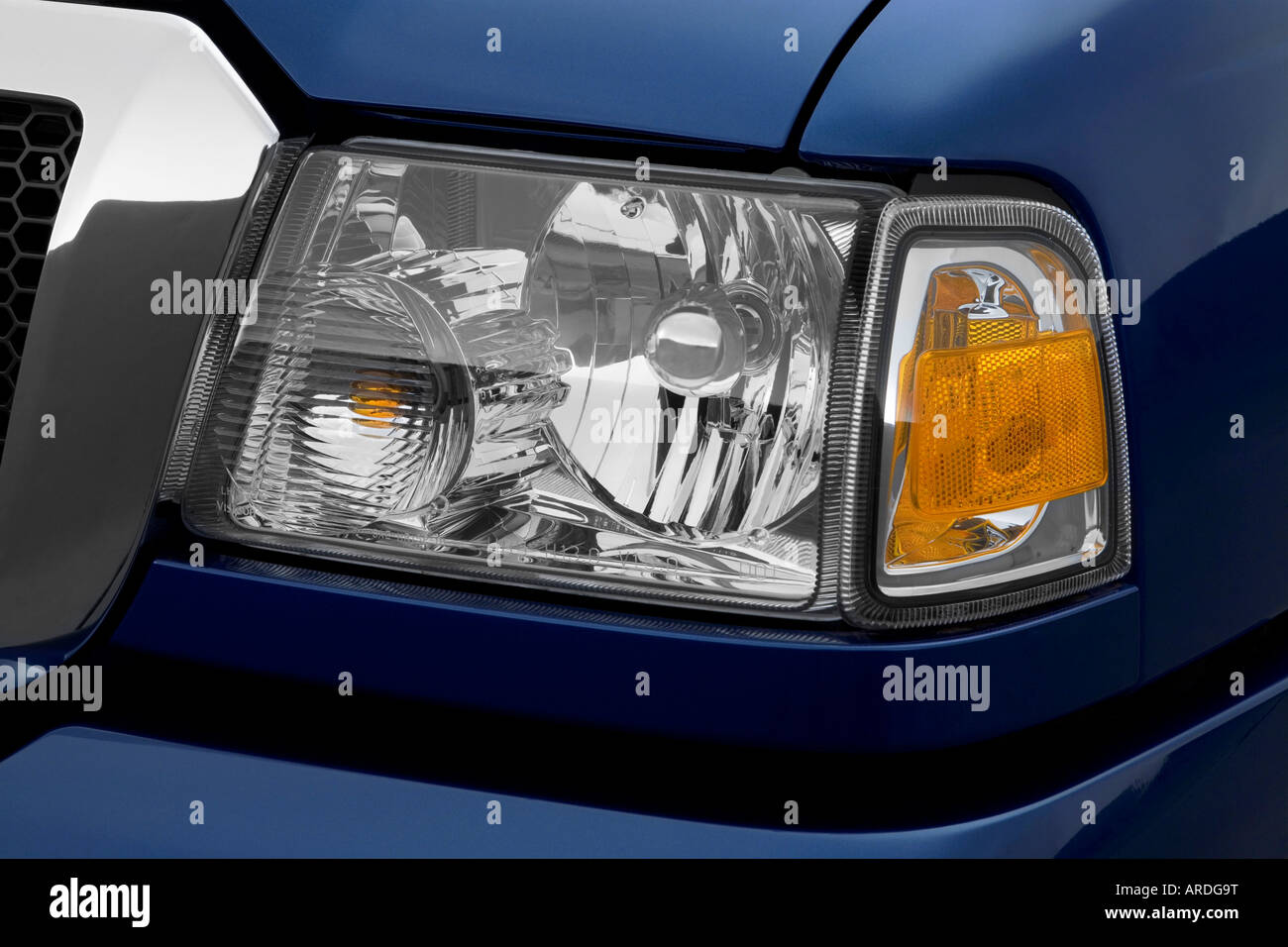 2007 Ford Ranger XLT in Blue - Headlight Stock Photo - Alamy