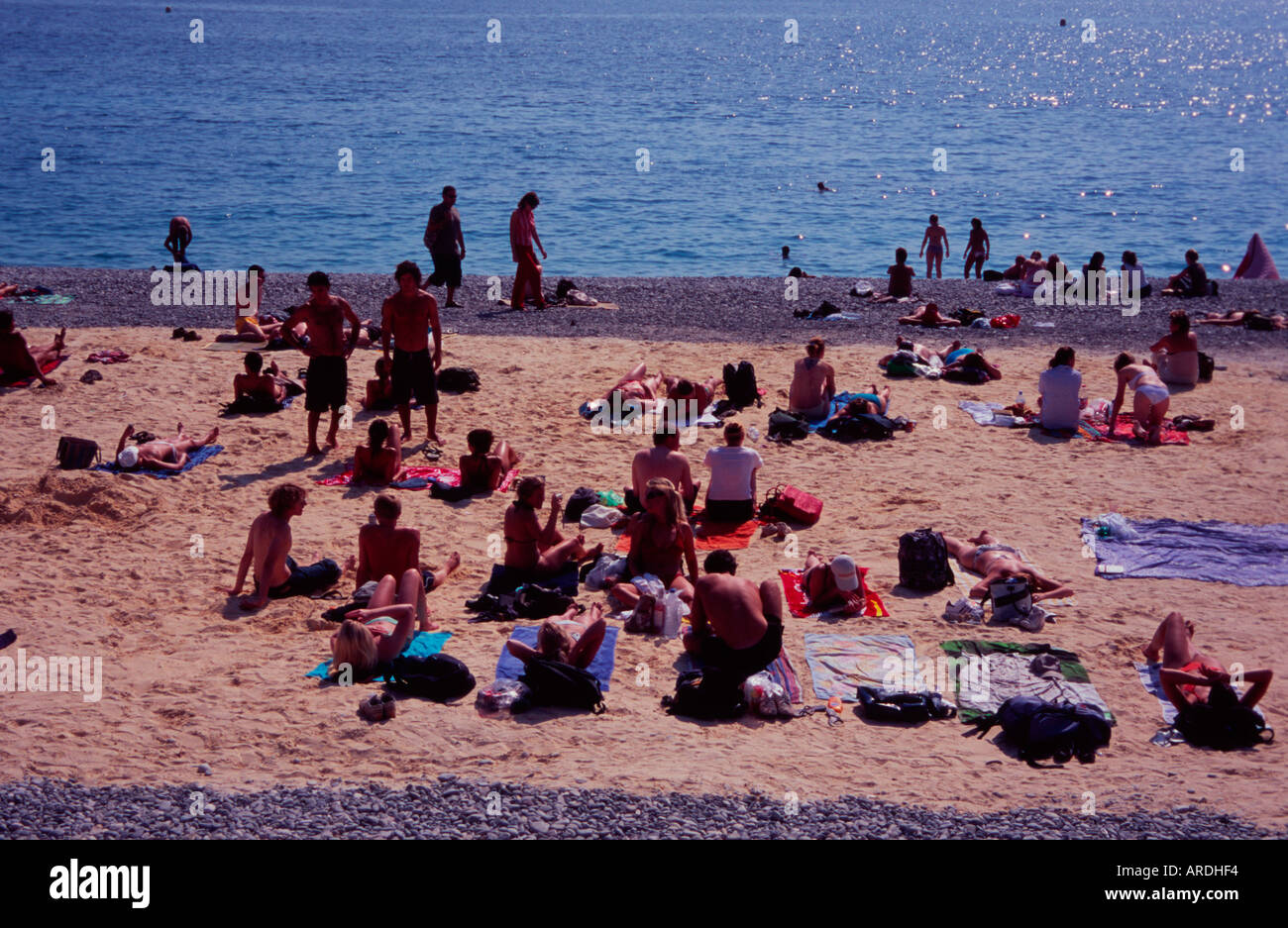 People sunbathing on an artificial beach, Nice, France Stock Photo - Alamy