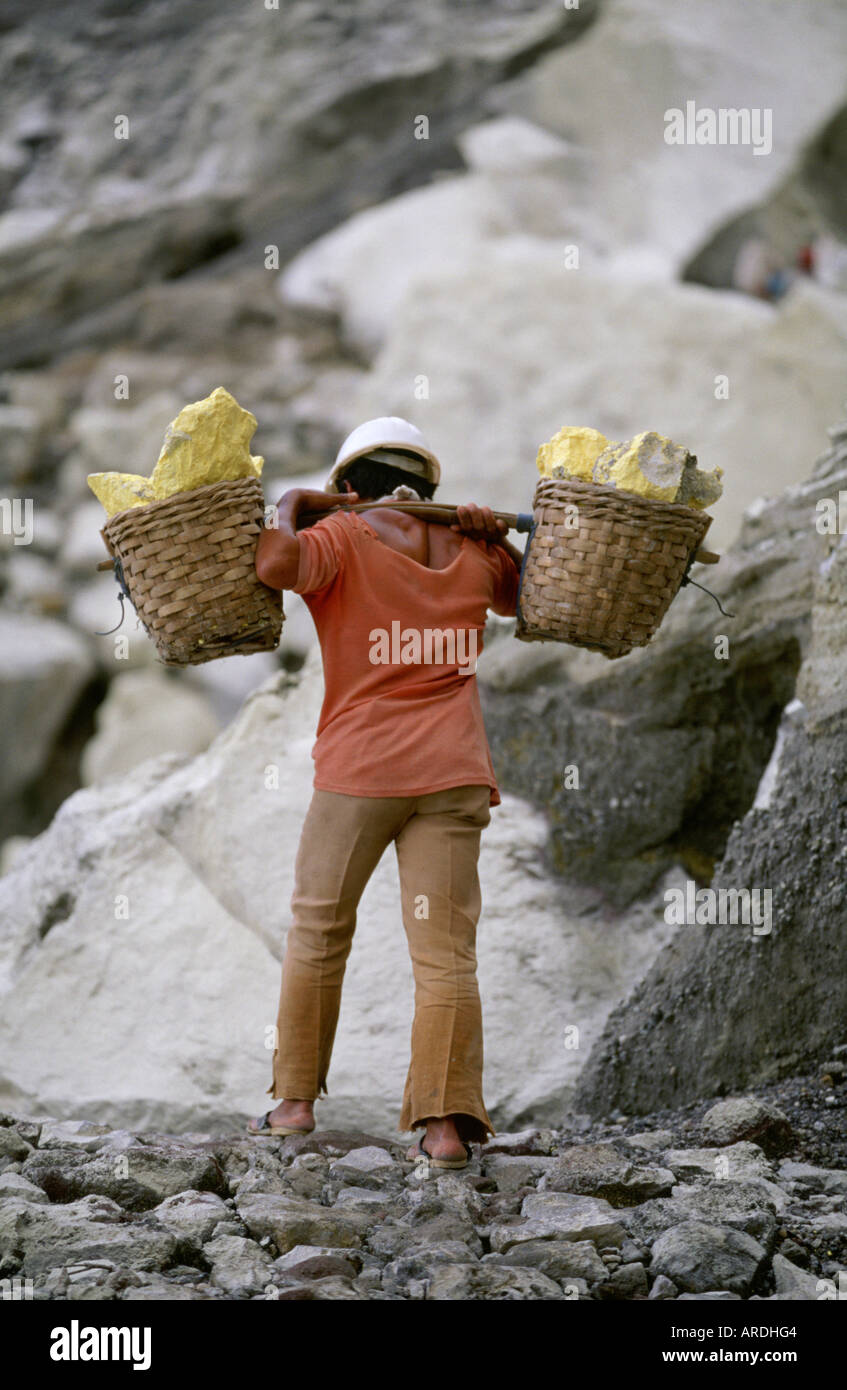 Men working inside the live volcano of Kawah Ijen in East Java ...