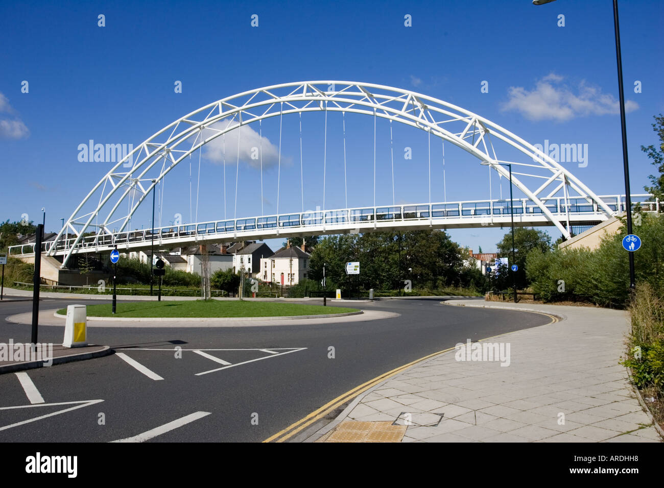 50m steel white arched footbridge carrying cycle track near Waitrose ...