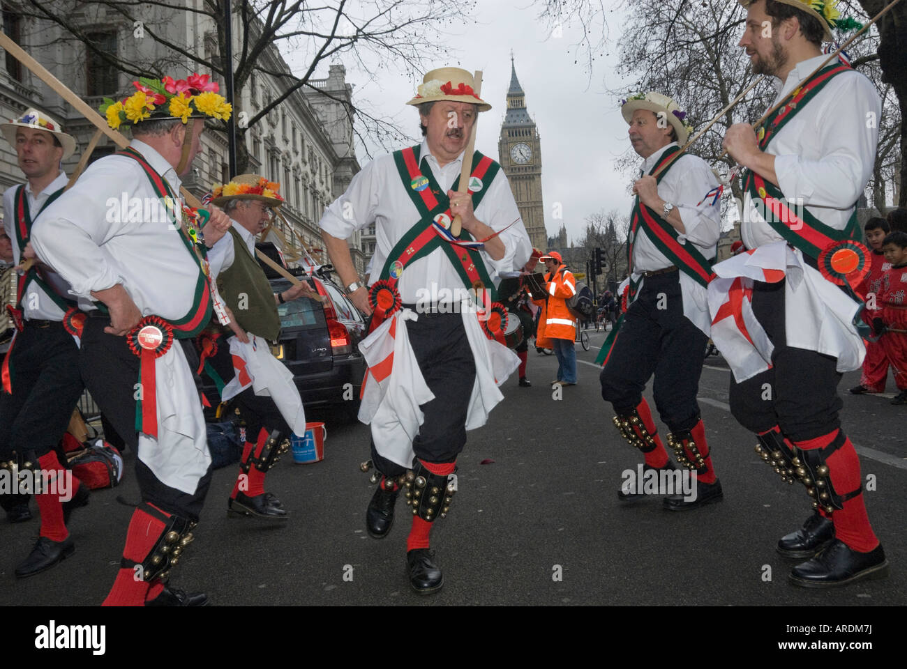 Six Morris Men dancers in sword dance on street in front of Big Ben in ...
