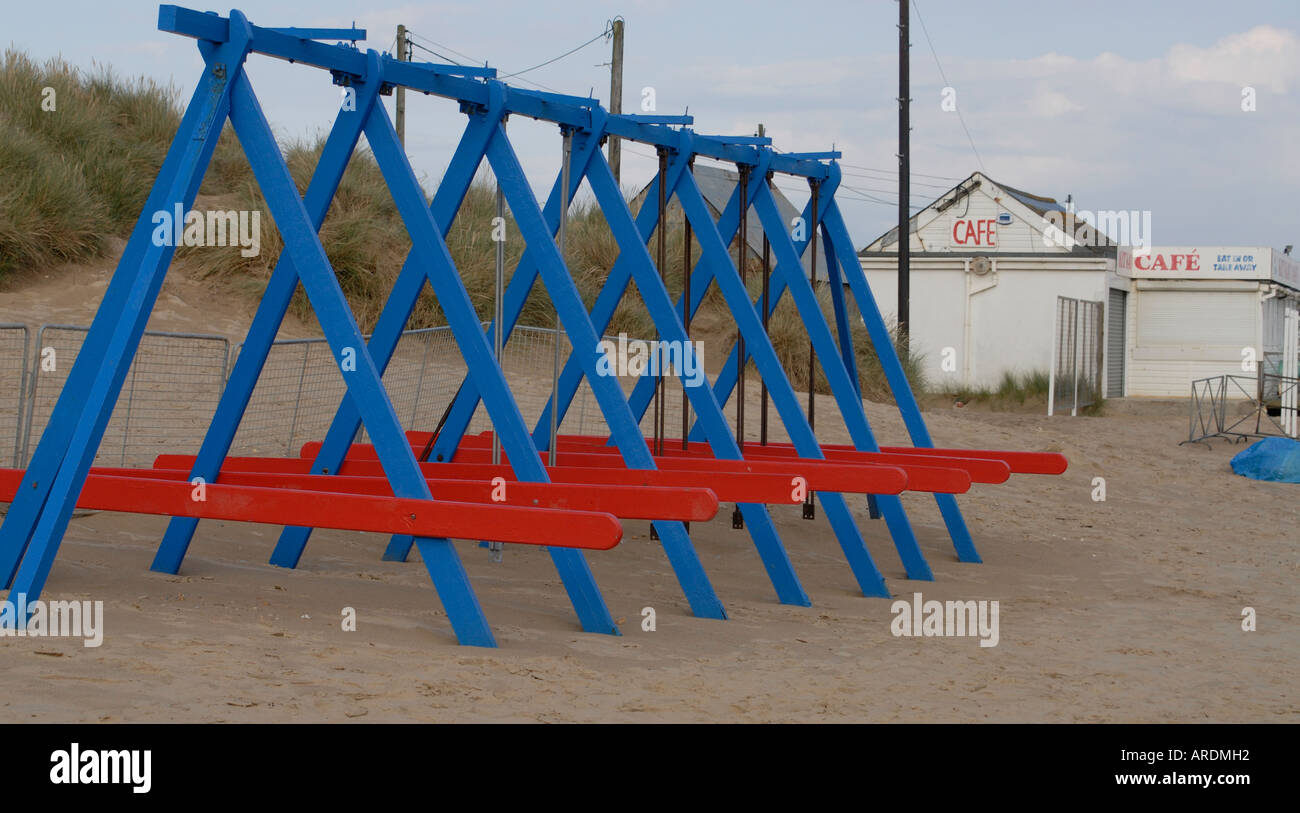 Red swings hi-res stock photography and images - Alamy