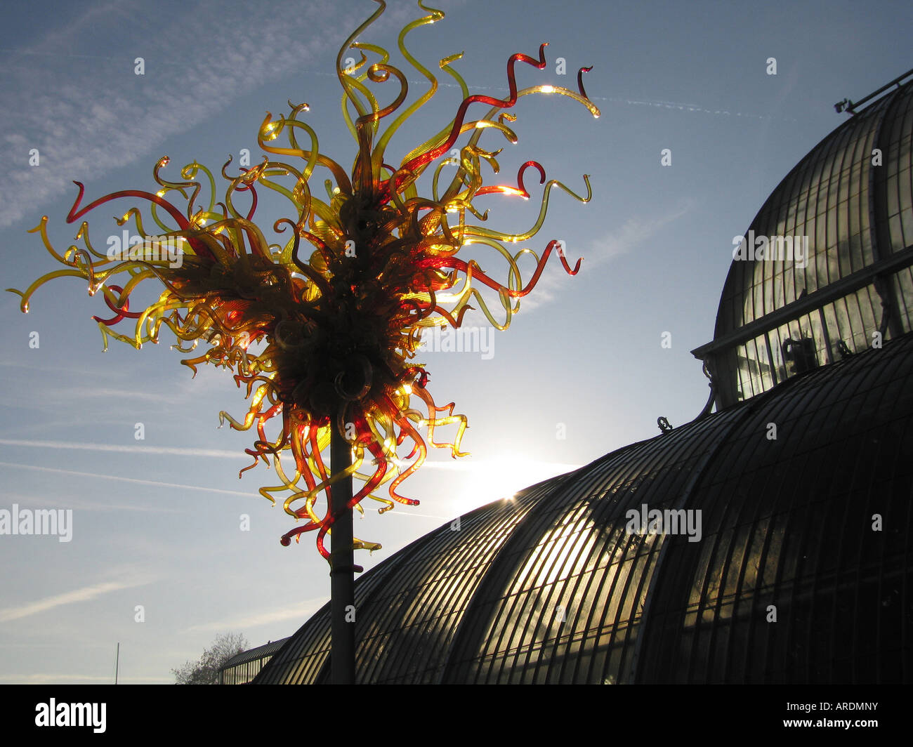 Glass blown abstract sculpture from artist Dale Chihuly with sunset ...