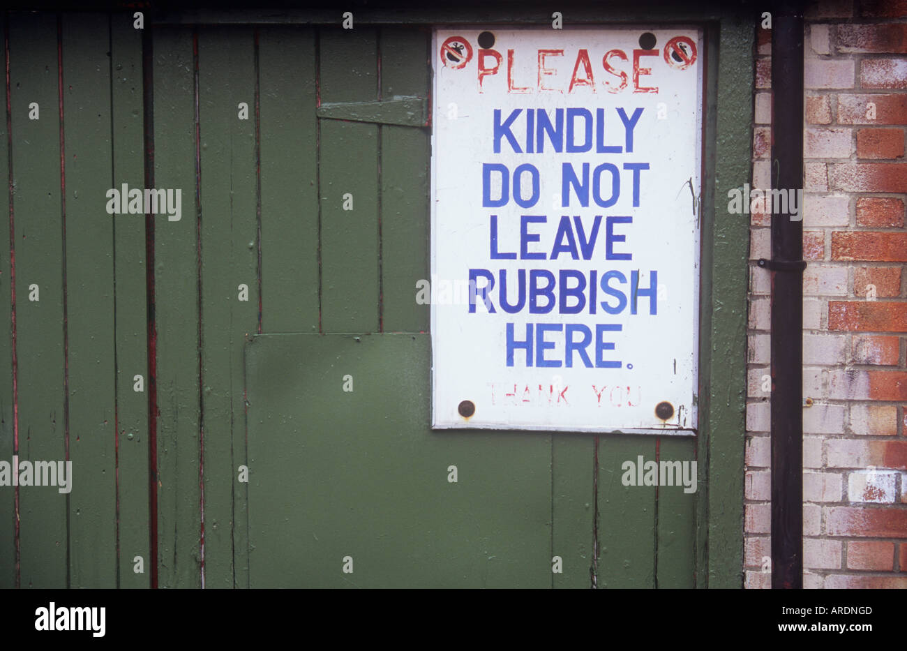 Fading sign stating Please Kindly do not leave rubbish here Thank you ...