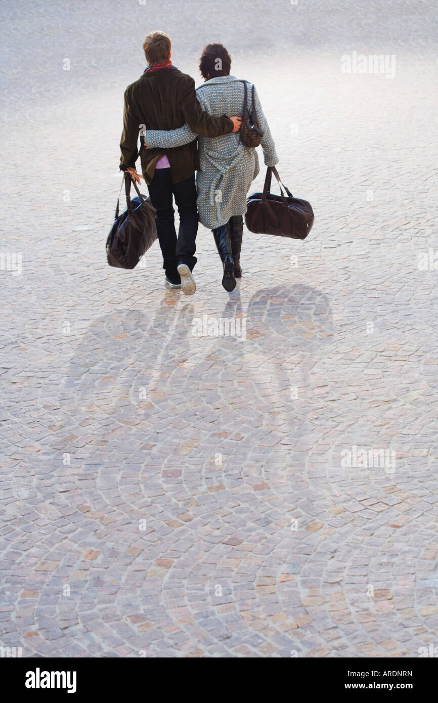 Man and woman arm in arm Stock Photo - Alamy