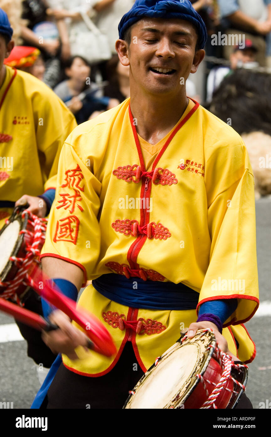 A drummer performs at a drumming and dancing summer festival in ...